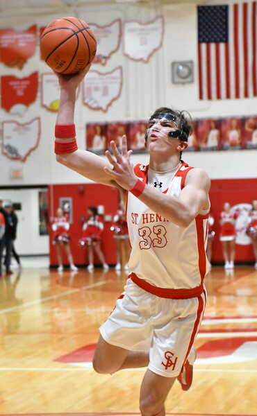 St. Henry vs Celina boys basketball Photo Album | The Daily Standard